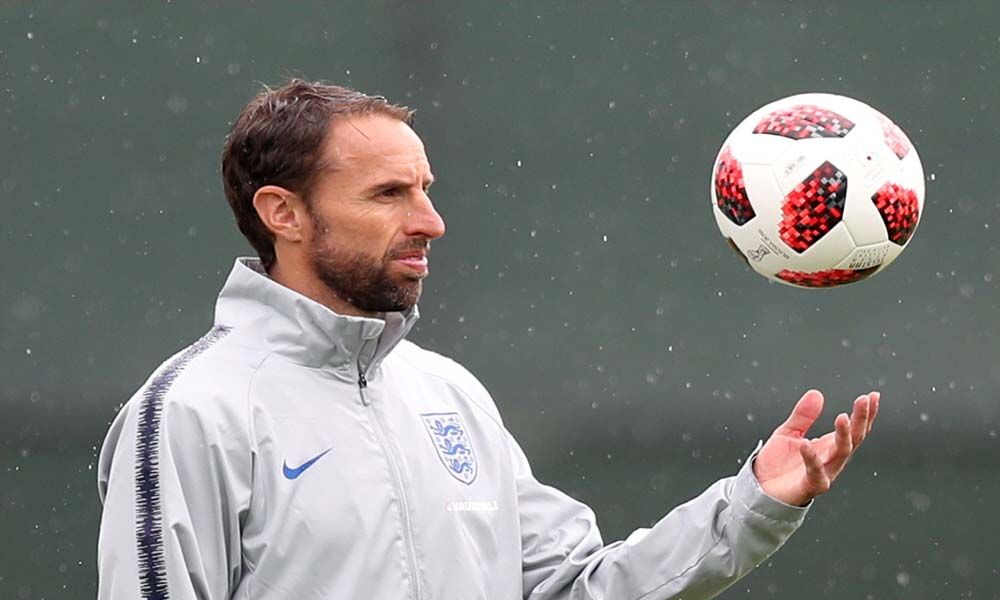 Did Boris Johnson flinch to England soccer team's knee-taking gesture