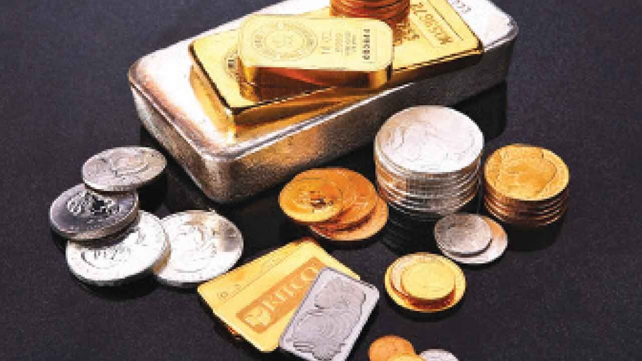 Precious metals gain in futures trade